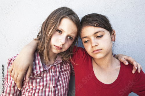 "sad sisters supporting each other" Stock photo and royalty-free images ...