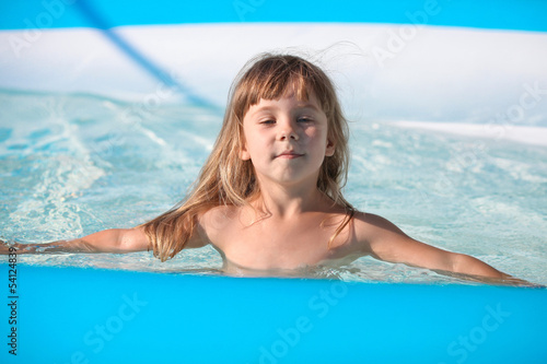 "Little girl in swimming pool." Stock photo and royalty-free images on ...