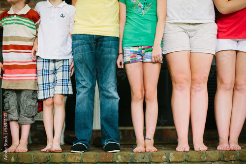 "Legs of kids standing together." Stock photo and royalty-free images ...