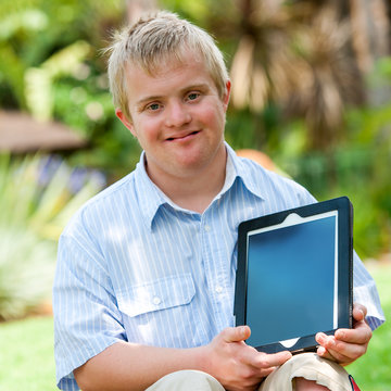 Down Syndrome Tablet Images – Browse 835 Stock Photos, Vectors, and ...