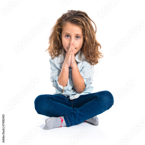 "Blonde little girl pleading over white background" Stock photo and ...