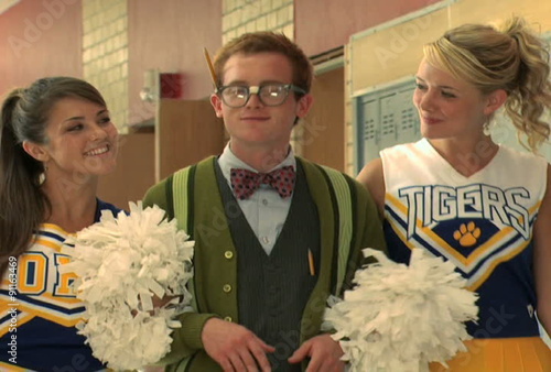"nerd walking with two cheerleaders" Stock footage and royalty-free ...