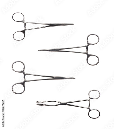 "Close up of four different stainless steel surgical forceps" Stock ...