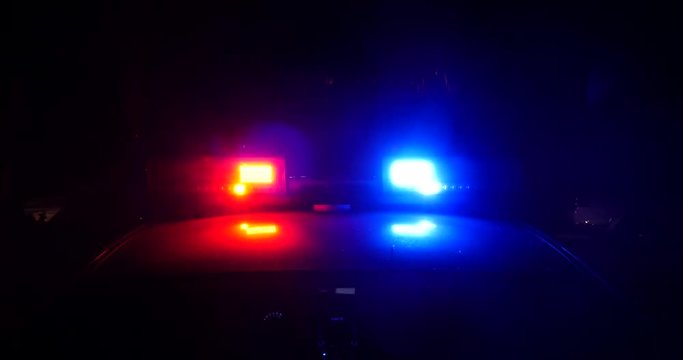 Police Lights Flashing At Night