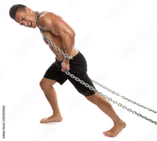 "Athletic man pulling a cargo of metal chains" Stock photo and royalty ...