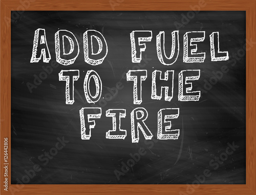 "ADD FUEL TO THE FIRE handwritten text on black chalkboard" Stock photo ...