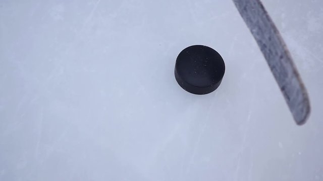 Hockey Puck Sliding On Ice