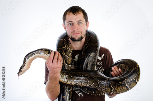 "Beautiful man and snake in the studio" Stock photo and royalty-free ...