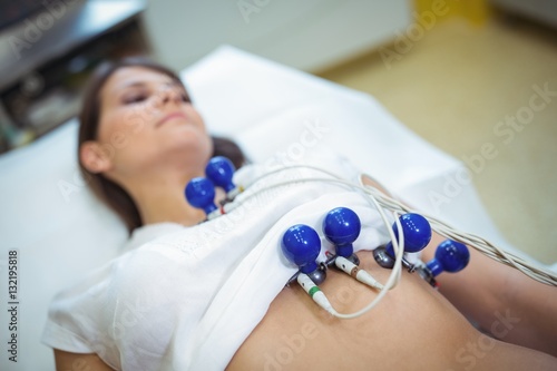 "Female patient undergoing an electrocardiogram test" Stock photo and ...