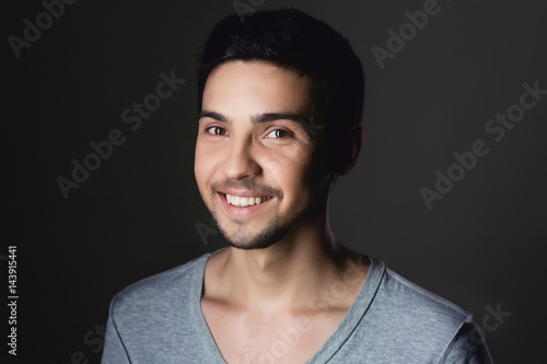 "Portrait of a normal boy over grey background . Attractive young man ...