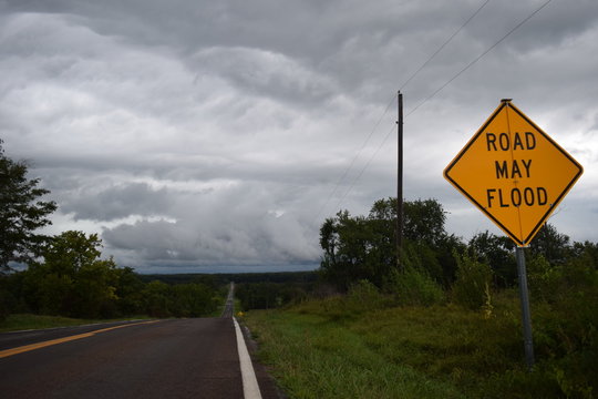 Road May Flood Sign