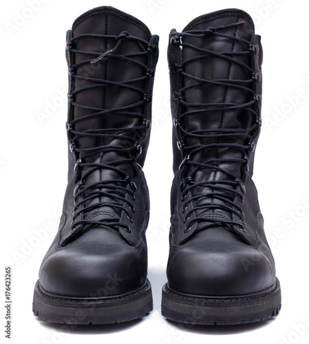 "Pair of black military style leather boots, isolated, front view ...