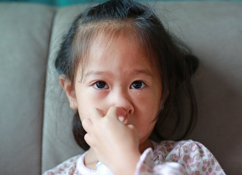 Girl Picking Boogers