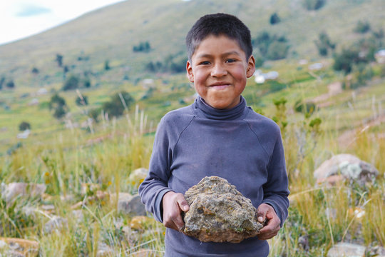 Person Holding Rock