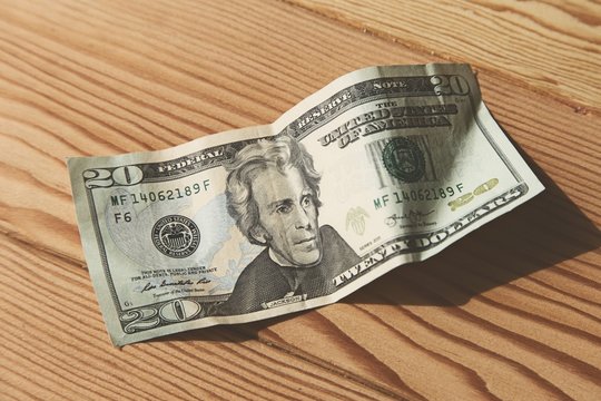 20 Dollar Bills On Table