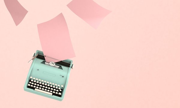 Pink Typewriter With Paper