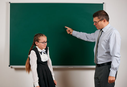 Teacher Helping Frustrated Student