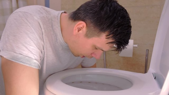 vomiting man