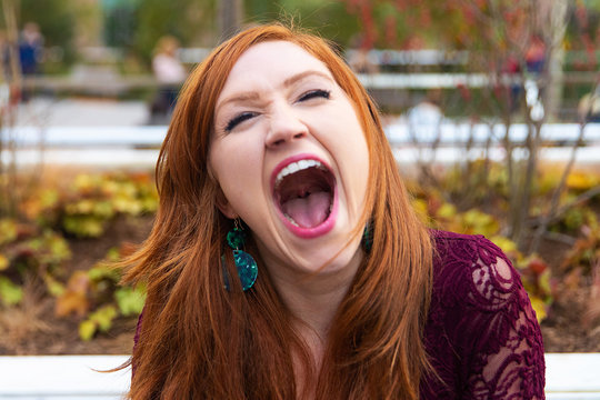 Woman Laughing Hysterically