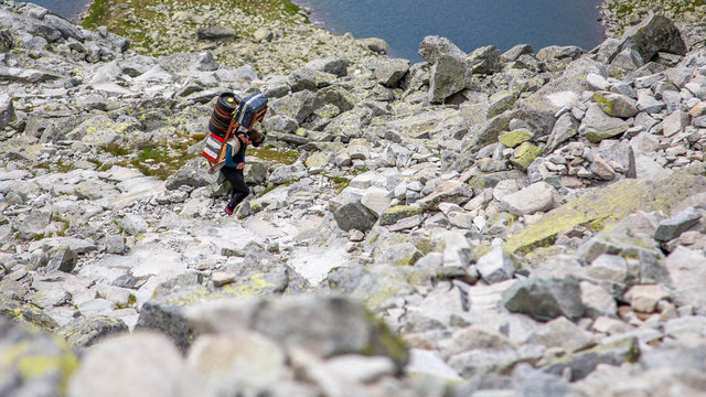 Man Carrying Heavy Rock Images – Browse 868 Stock Photos, Vectors, and ...