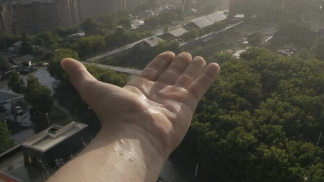 Raindrops Falling On Hands