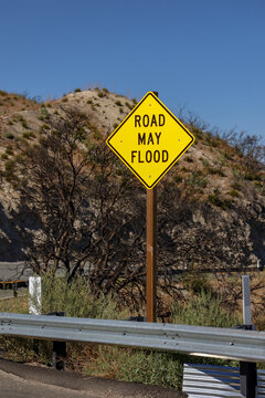 Road May Flood Sign