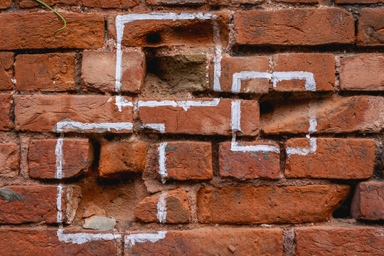 Bullet Holes In Brick Wall