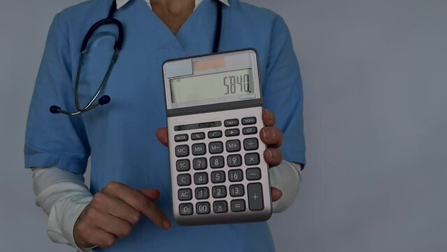 Doctor With Calculator Images – Browse 9,210 Stock Photos, Vectors, and ...