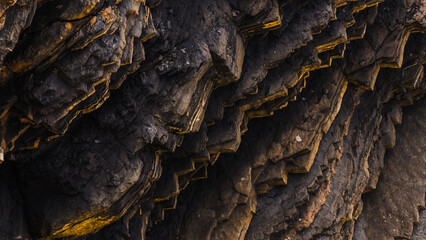 Jagged rock textures in Cantabria under evening light