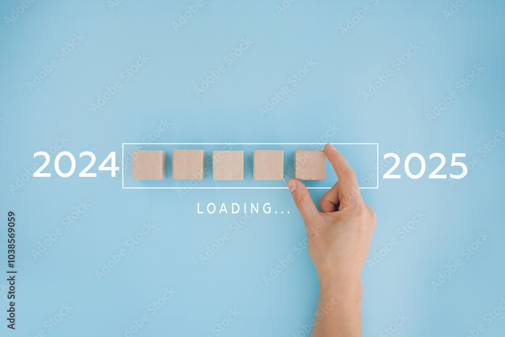 2025 New Year Loading Female hand moving wooden bl | WallsHeaven ...